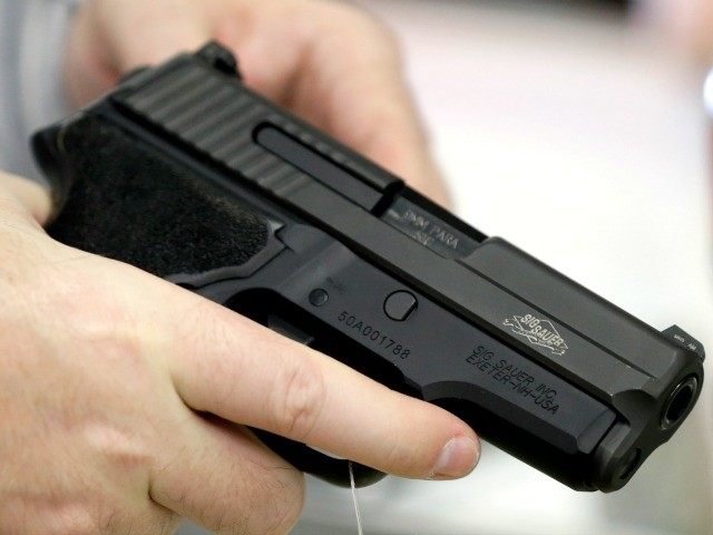 Gun Page:World News:Armed Customer Shoots, Stops Hatchet Attack in 7 ...