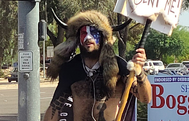 World News:Q-Anon Shaman Released Early From Prison After J6 Footage ...